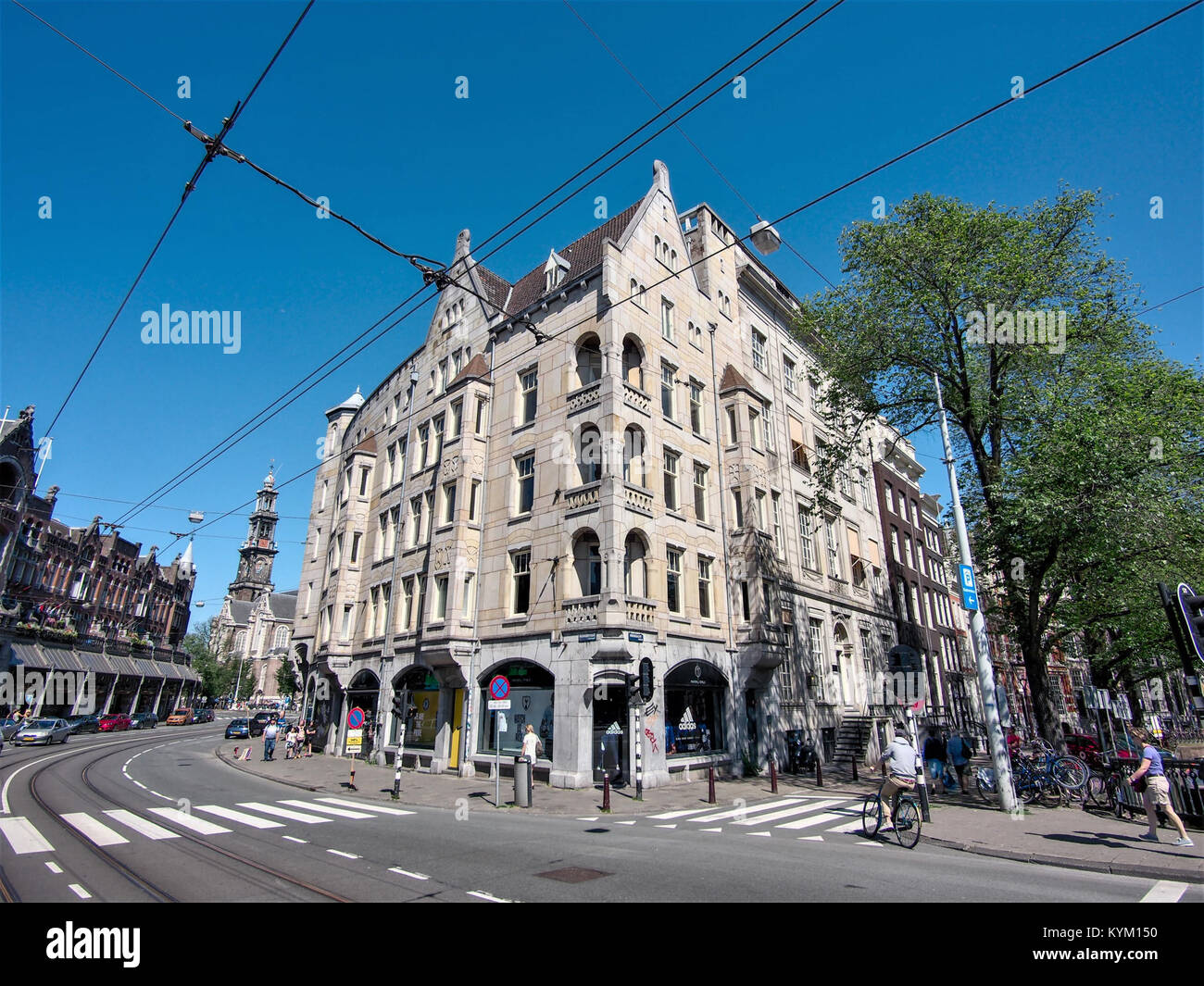 A historical photograph of the intersection between Raadhuisstraat and ...