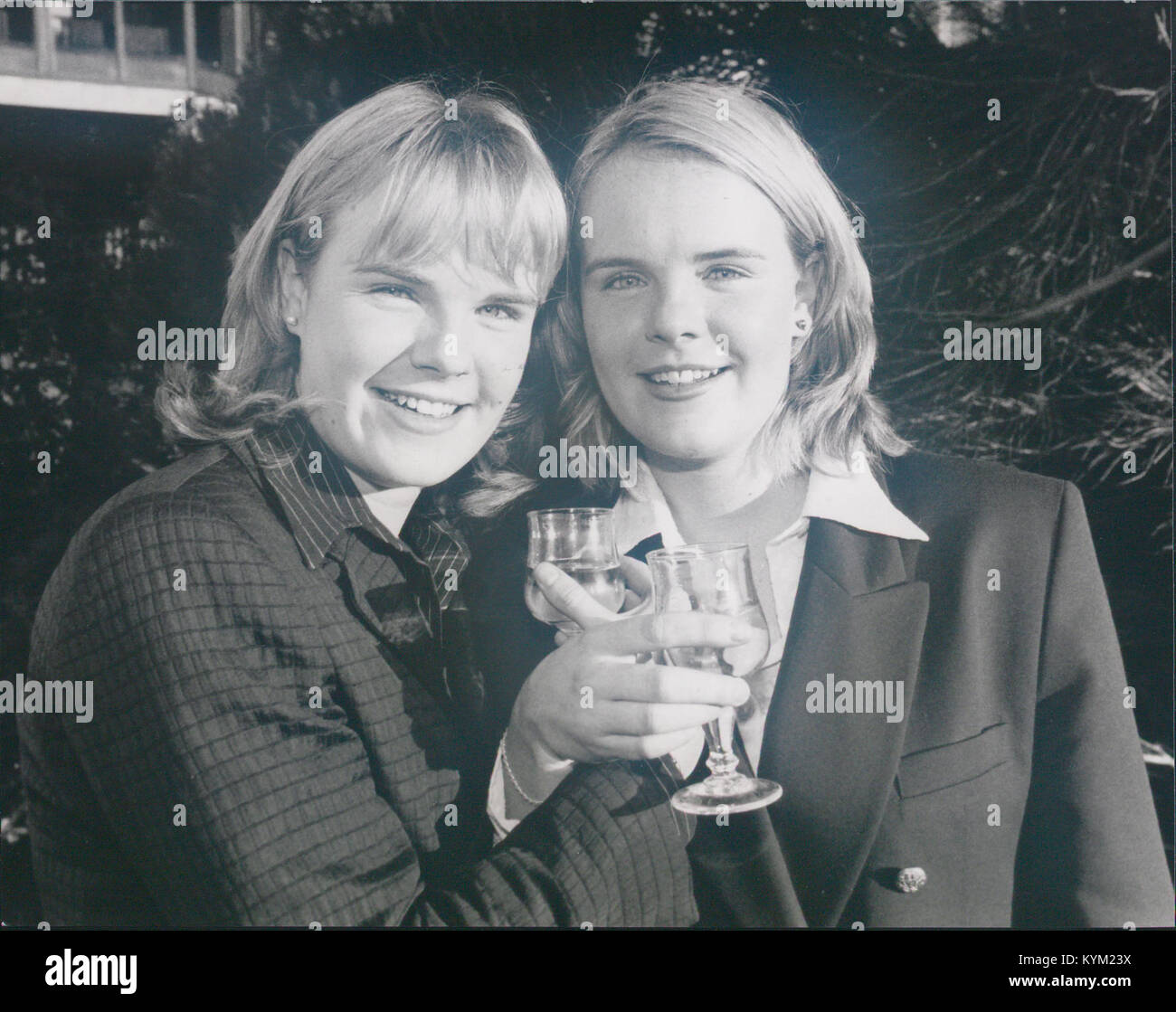This image features identical twins Jennifer and Alison O'Brien ...