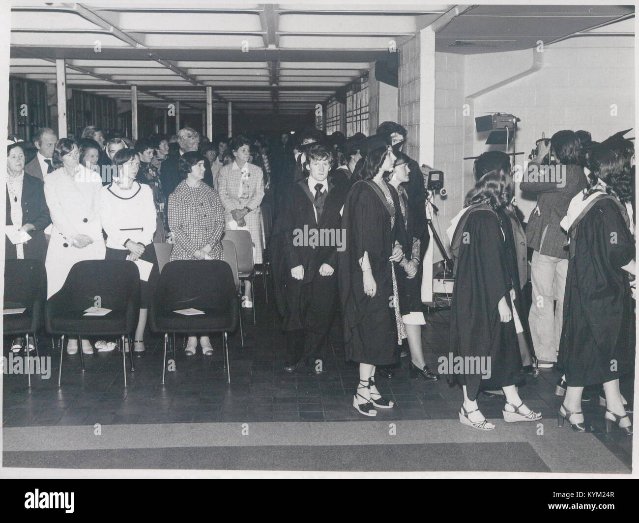 Photograph from a 1977 graduation ceremony, capturing the graduates in ...