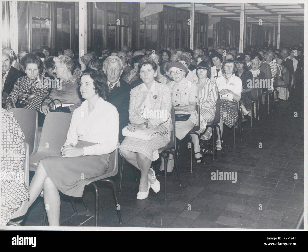 A photograph of a graduation ceremony held in 1977. The image captures ...