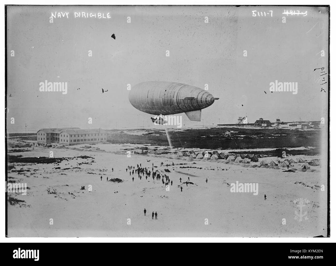 This historical illustration shows a Navy dirigible, capturing a moment ...