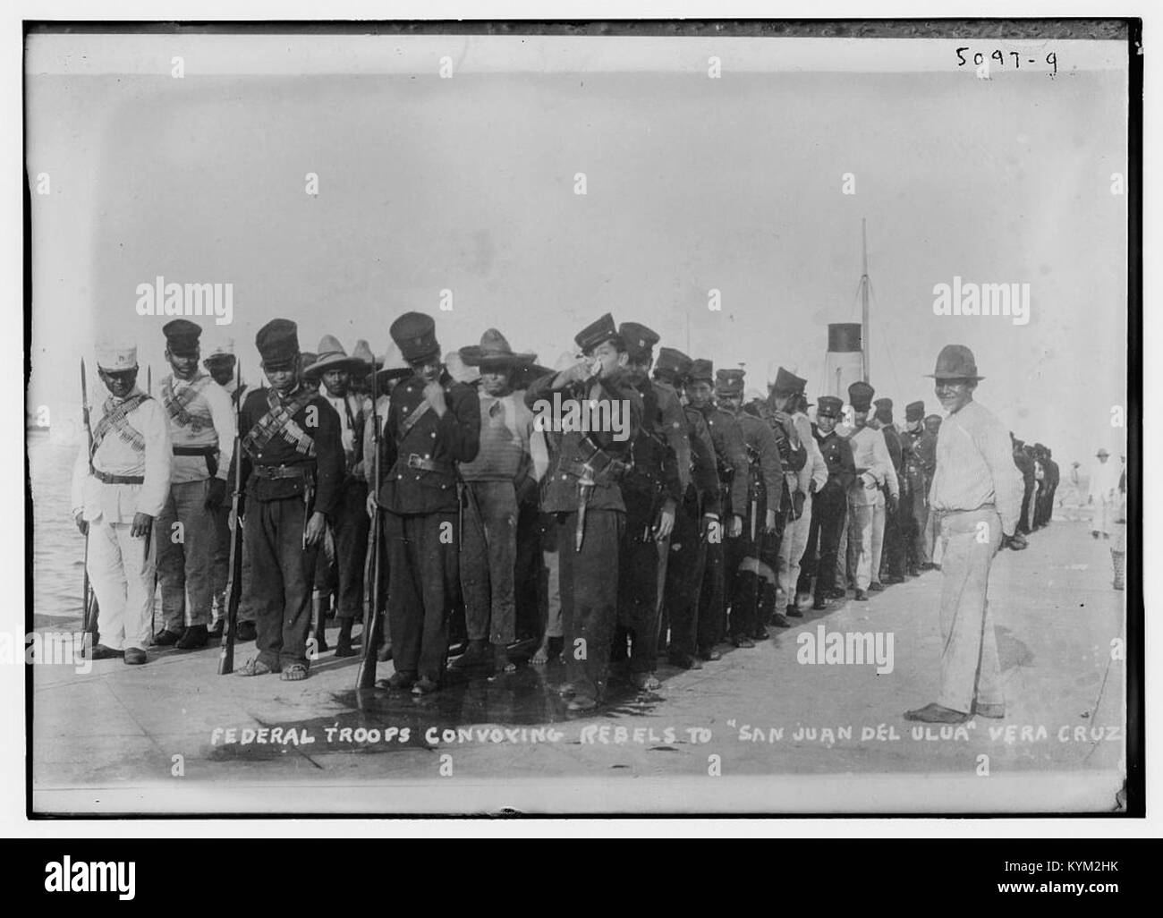A historical illustration showing federal troops convoying rebels to ...