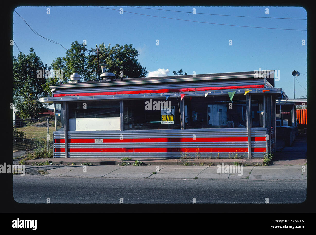 A historical photograph of a diner located on Pleasant Street in Fall ...