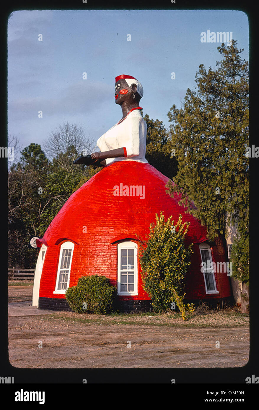 This image shows a side view of Mammy's Cupboard, a restaurant located ...