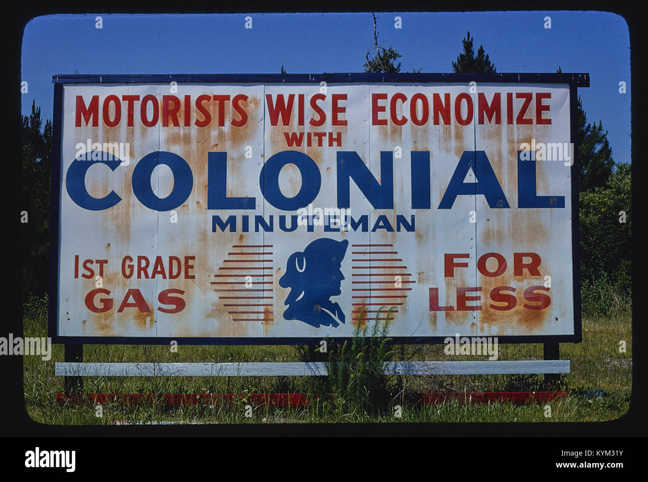 A vintage photograph of a Colonial Gas sign and billboard along Route ...