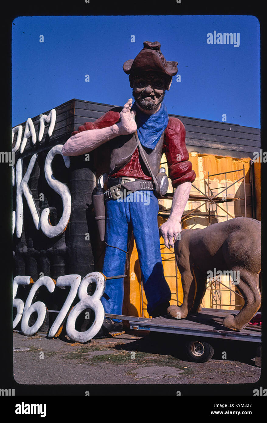 Photograph of the prospector statue and sign in Cheyenne, with detailed ...