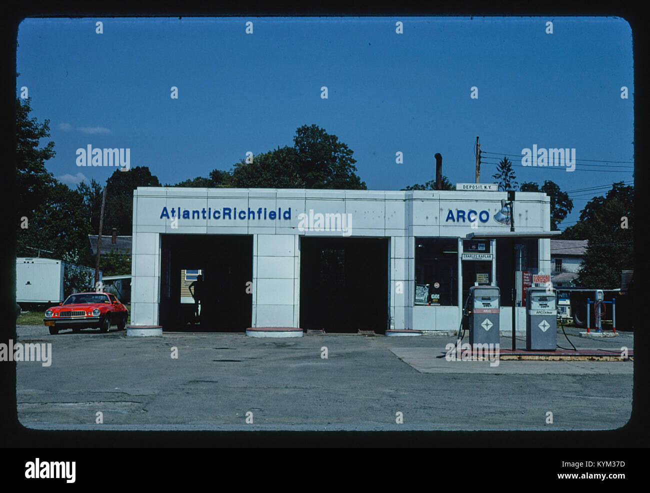 A historic photograph of the Arco gas station located on Route 10 in ...