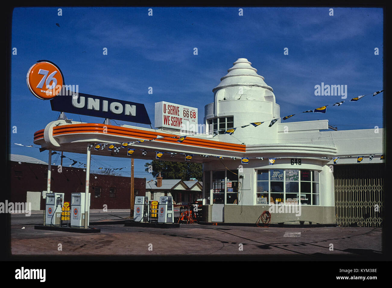 A historic photograph of the Union 76 gas station located at 4th ...