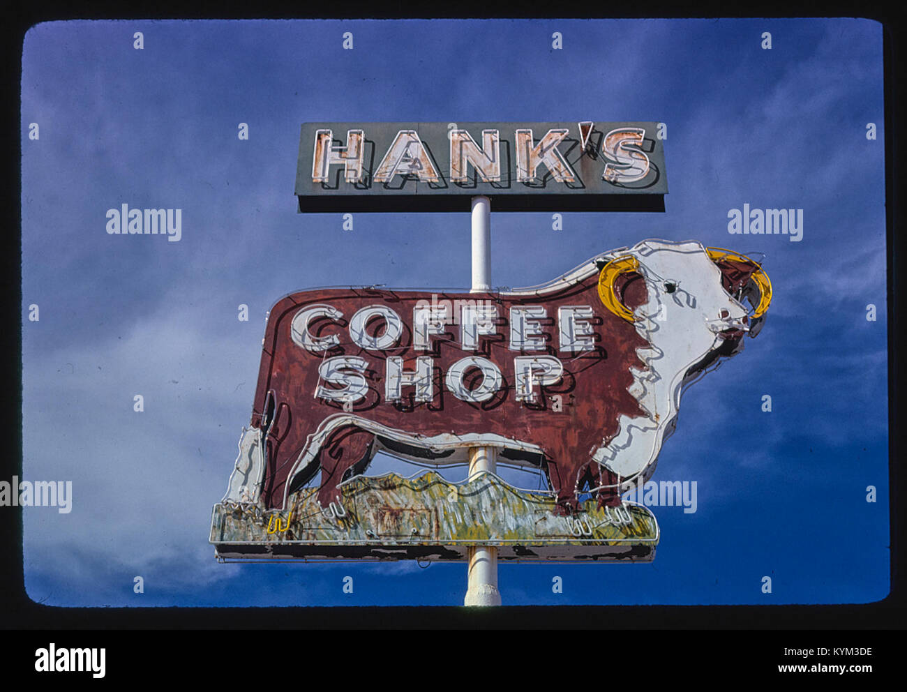This historic photograph showcases the vintage sign of Hanks Coffee ...