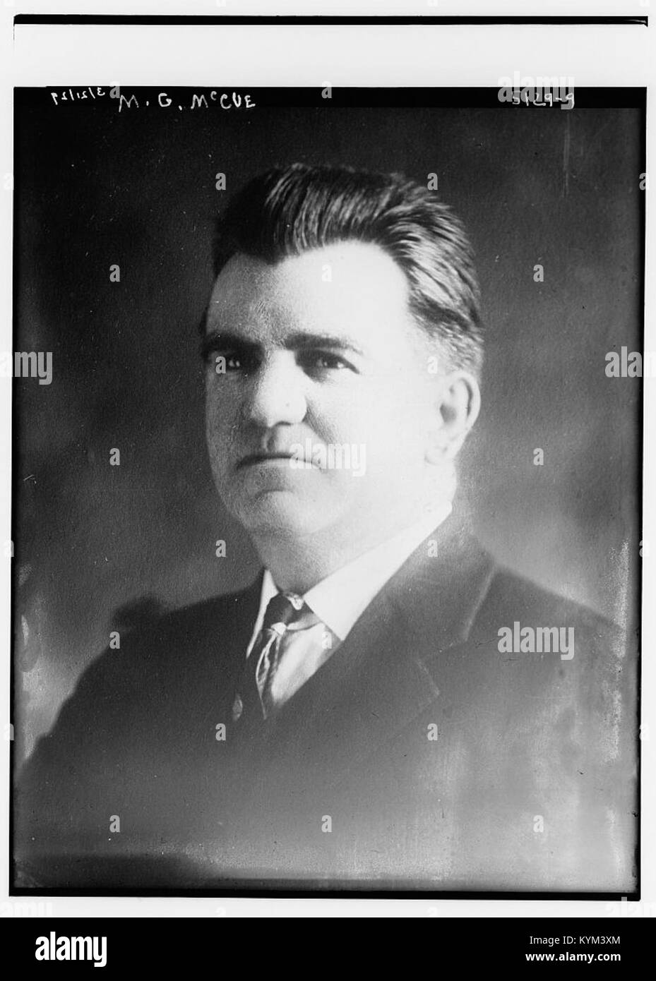 This historical image features MG McCue, a notable figure, captured in ...