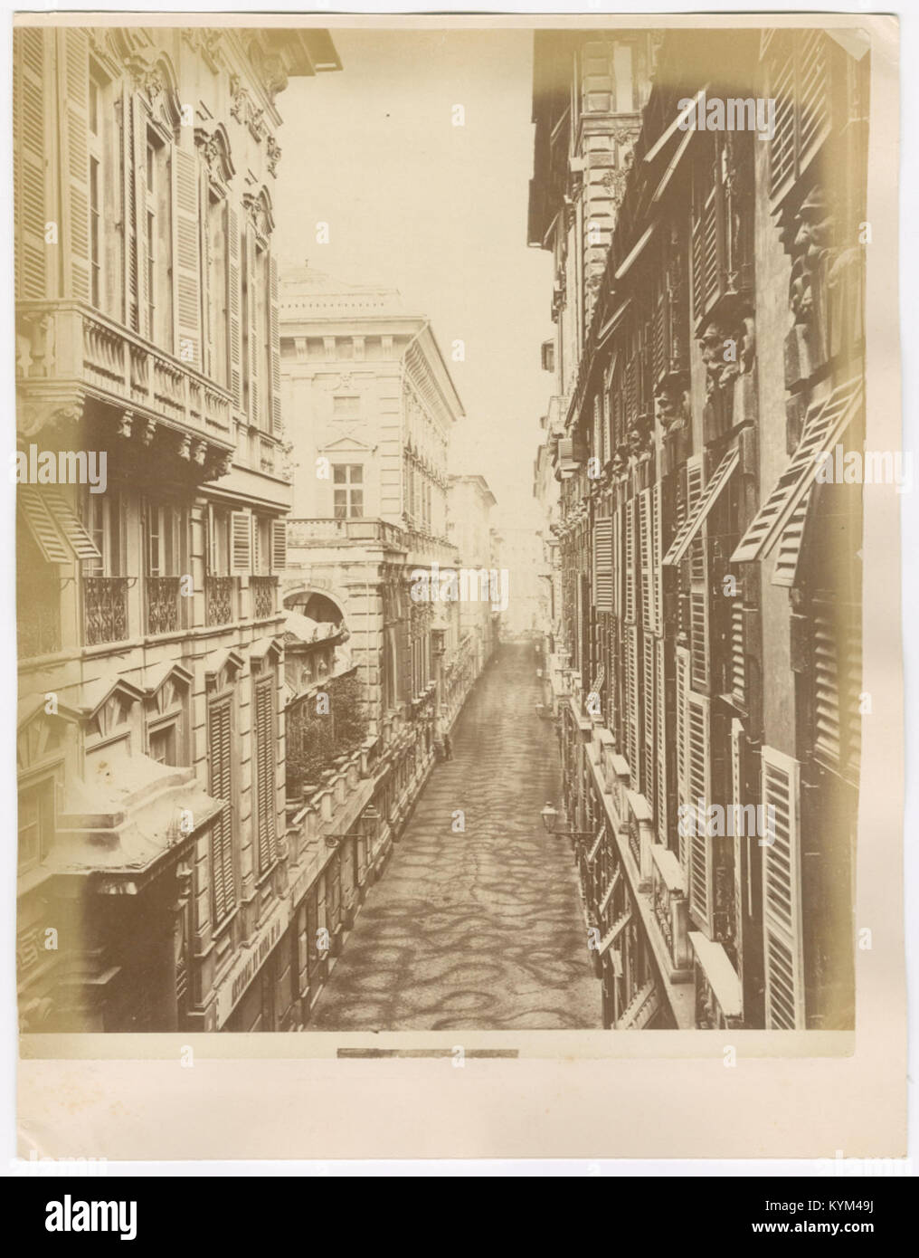 An empty city street captured in this photograph, showing the quiet and ...