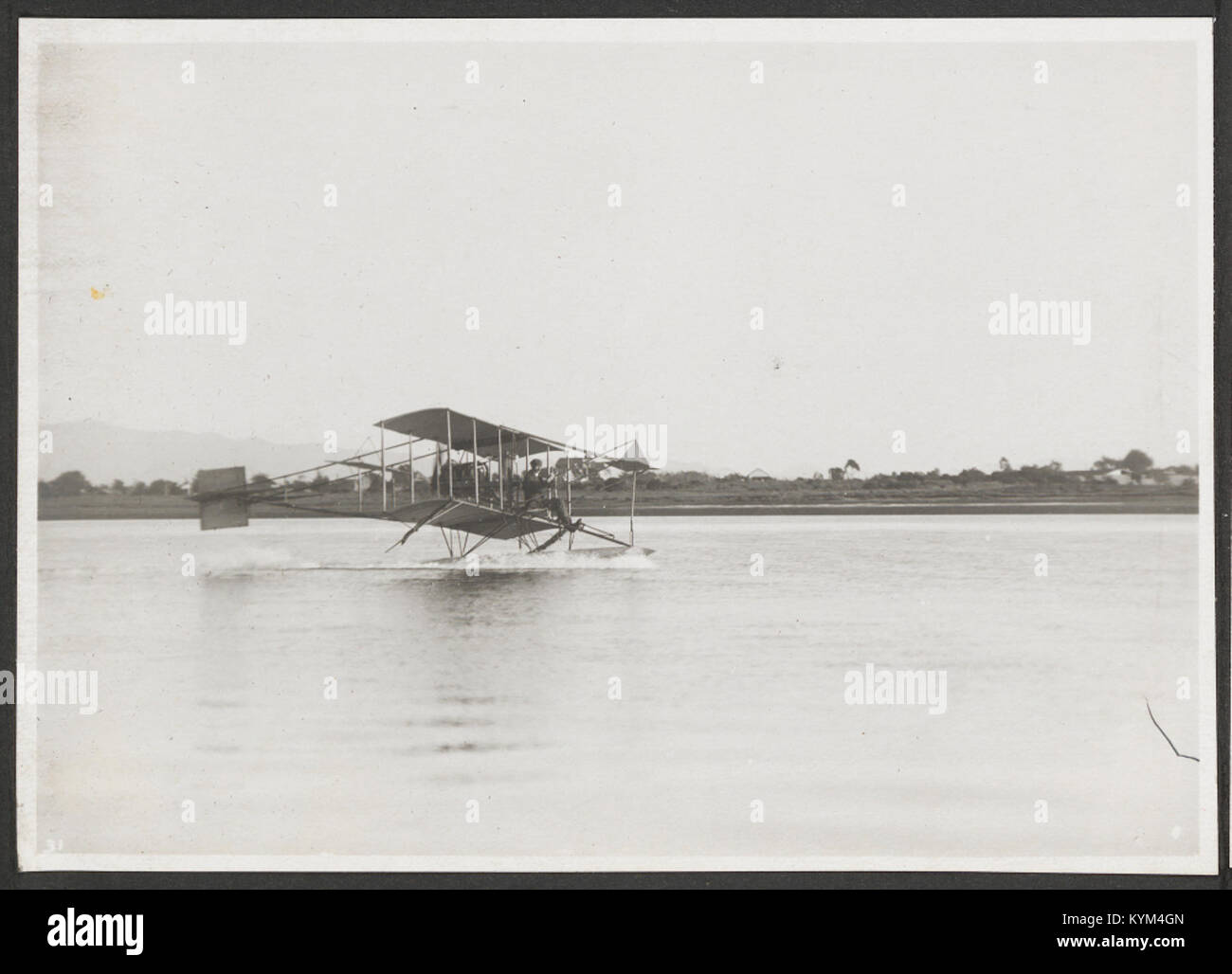 This historic photograph shows Glenn Curtiss piloting his Pusher ...