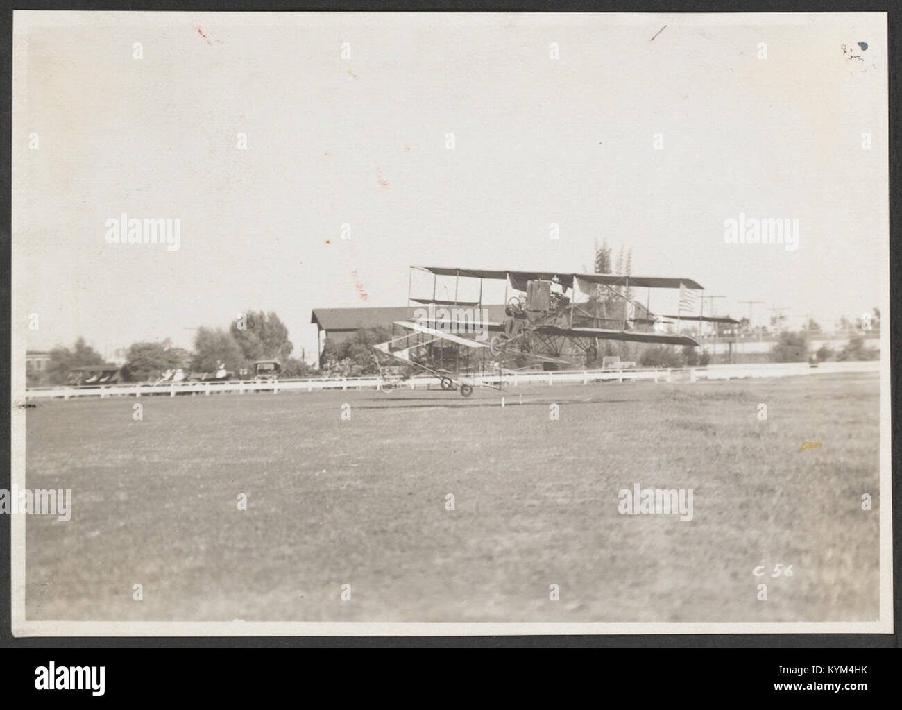 Two Curtiss biplanes in flight, captured during an early aviation event ...
