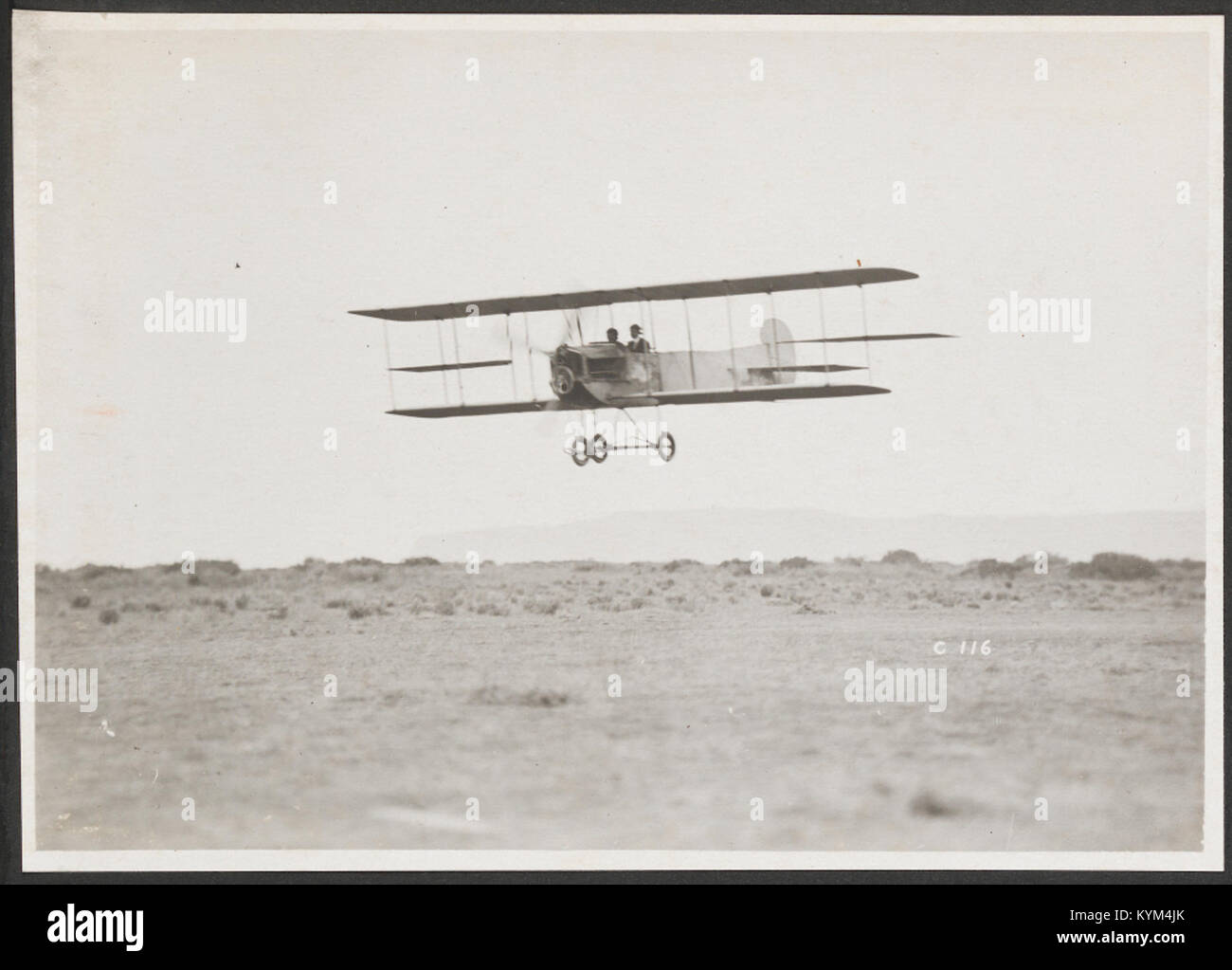 A historic photograph of the Curtiss Model G biplane in flight ...