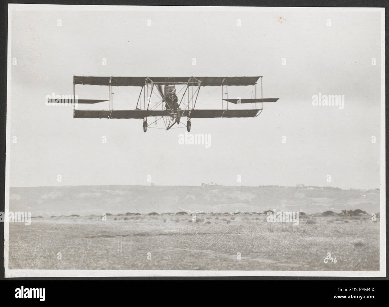 Photograph of a Curtiss Pusher biplane in flight. This historic ...