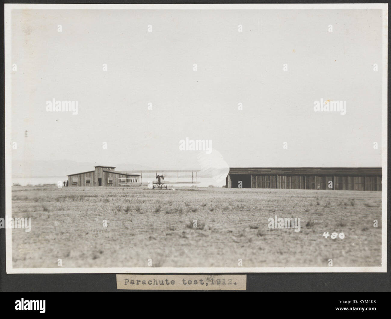 A parachute test from 1912, showcasing early experimentation with ...