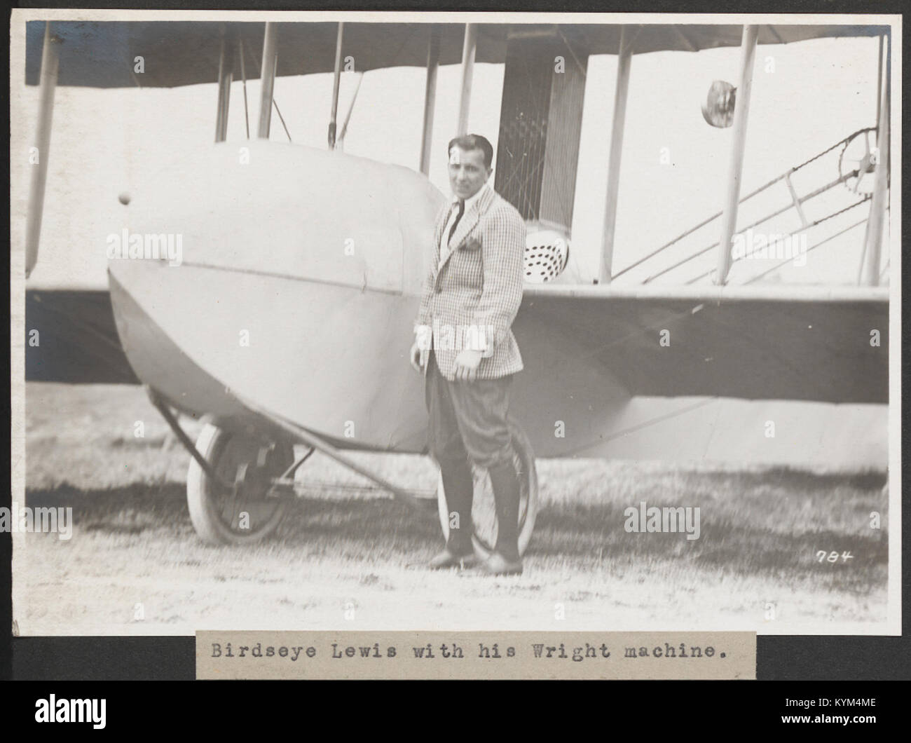 Birdseye Lewis pictured with his Wright brothers' aircraft, a ...