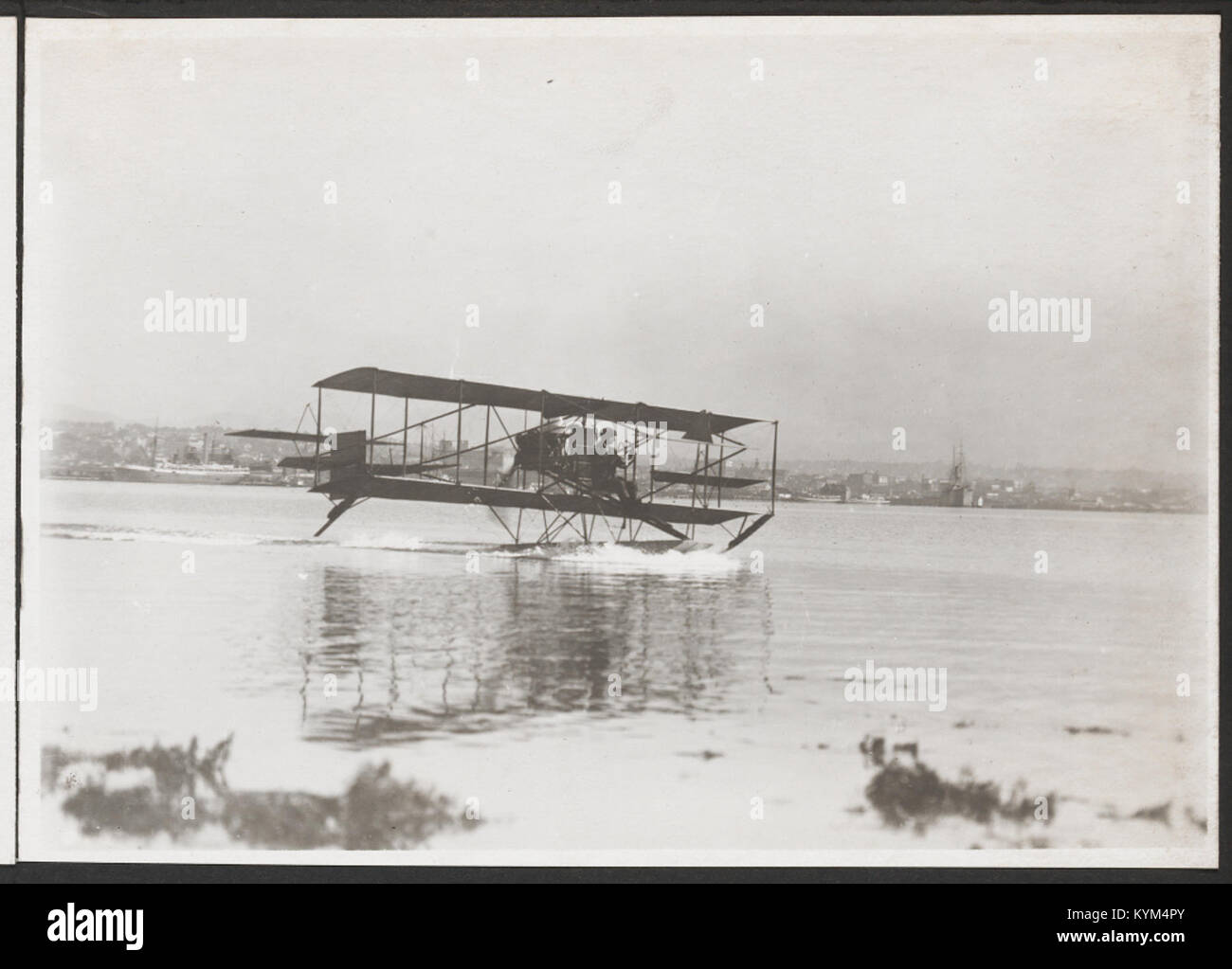 A historic image of the Curtiss Pusher, a pioneering biplane floatplane ...