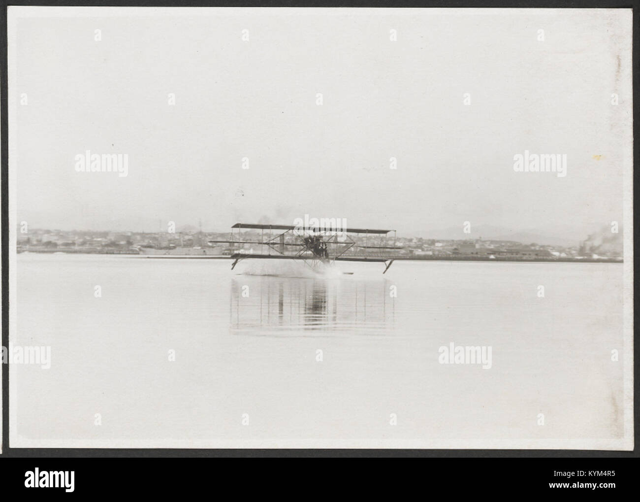 Glenn Curtiss piloting the Curtiss Pusher Floatplane, a pioneering ...