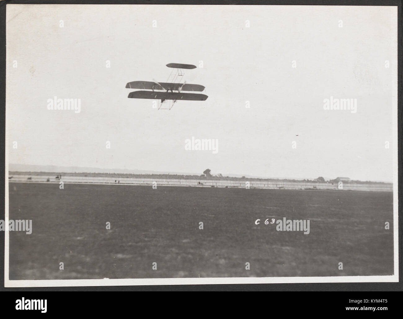 A historic image of a Wright Biplane diving to land. This photograph ...