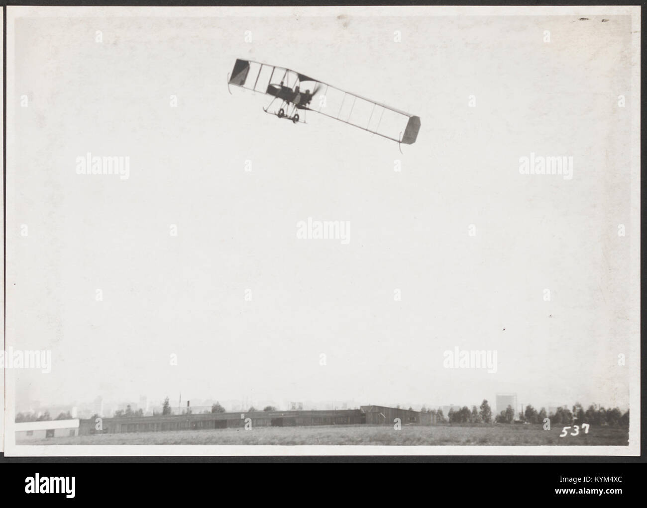 A photograph of the tailless Burgess-Dunne biplane in flight ...