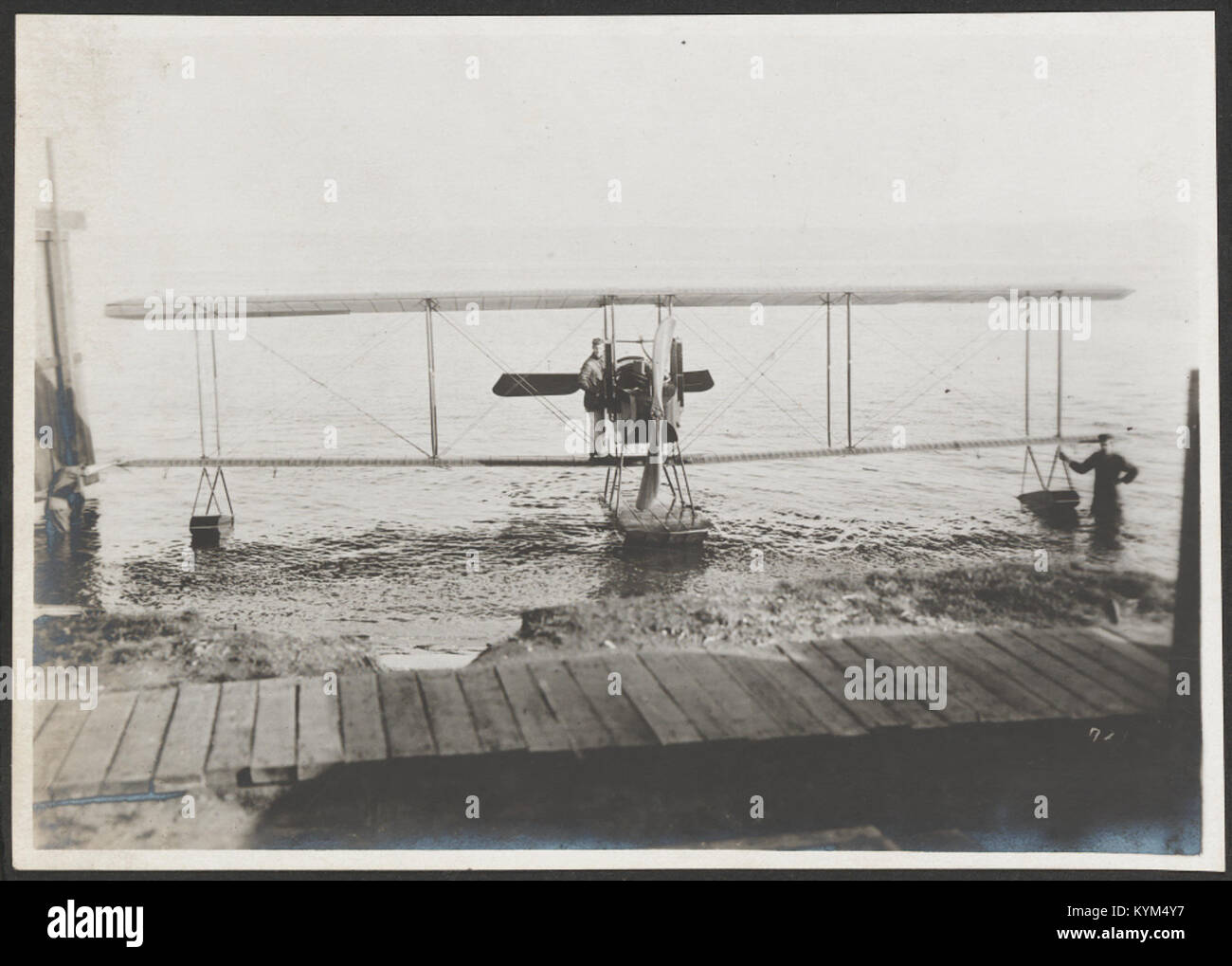 A historic photograph of a floatplane at Shorline, showcasing early ...