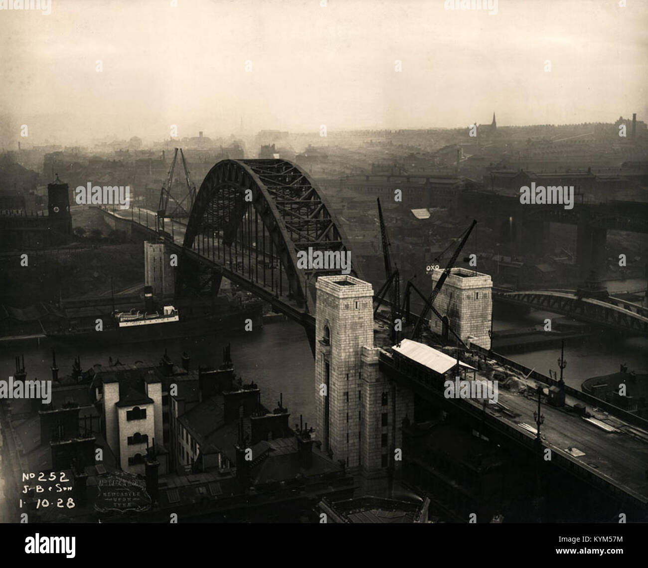 This image shows the Tyne Bridge nearing completion, capturing the ...