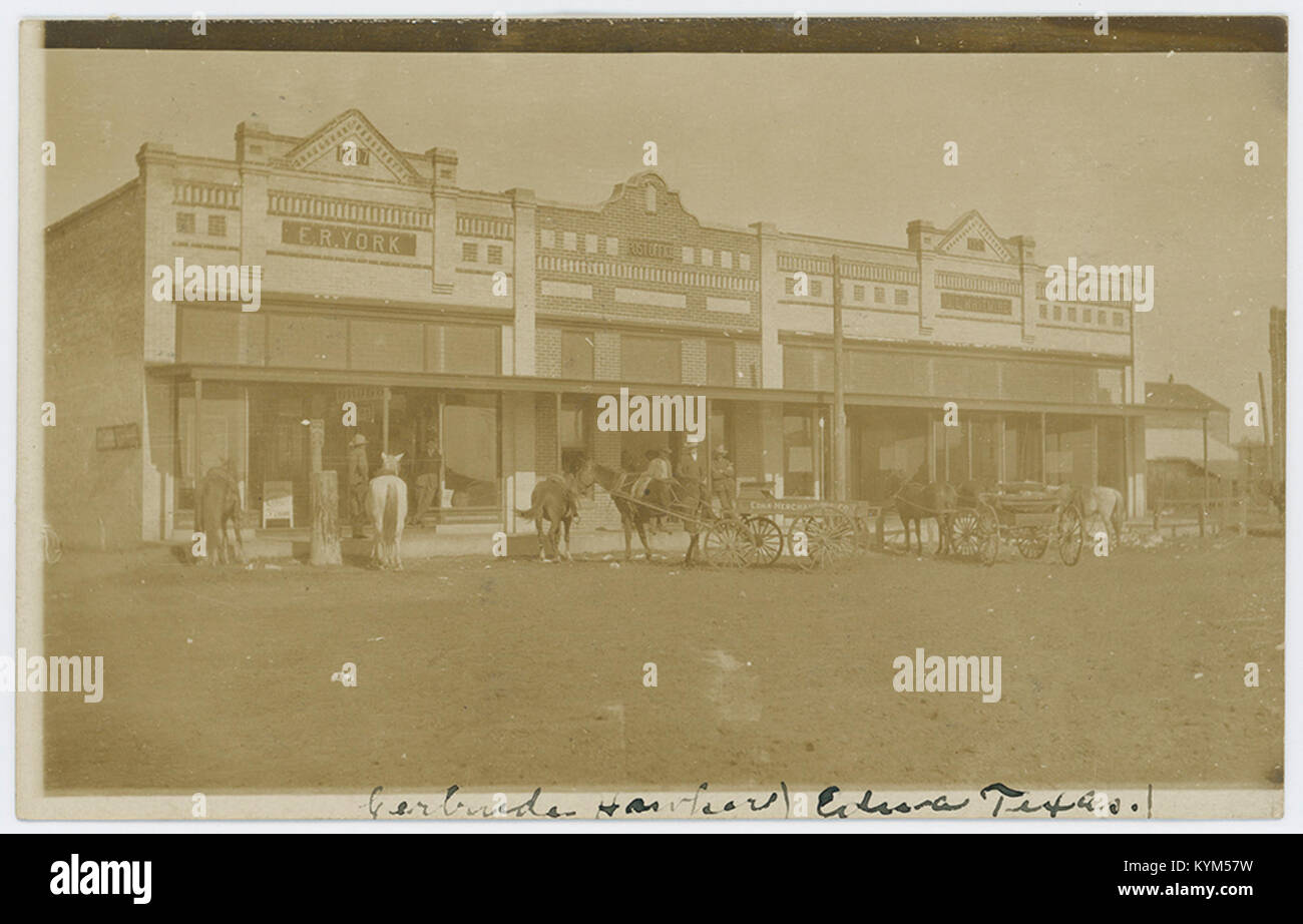 A historical image from Edna, Texas, featuring a street scene with ...