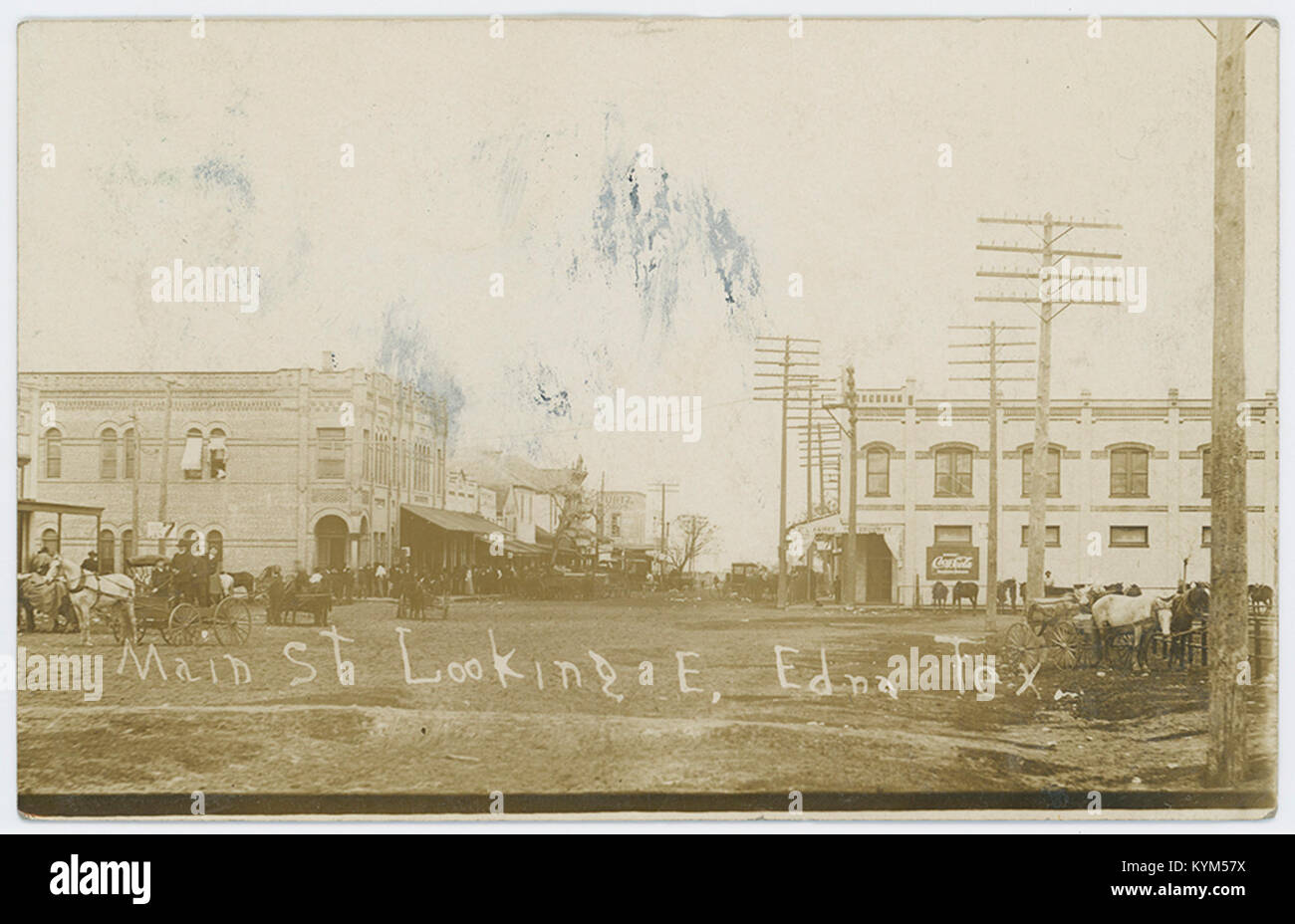 This image shows a historical view of Main Street in Edna, Texas ...