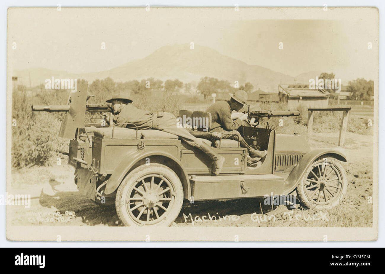 The image depicts a machine gun truck, equipped with a Lewis Machine ...