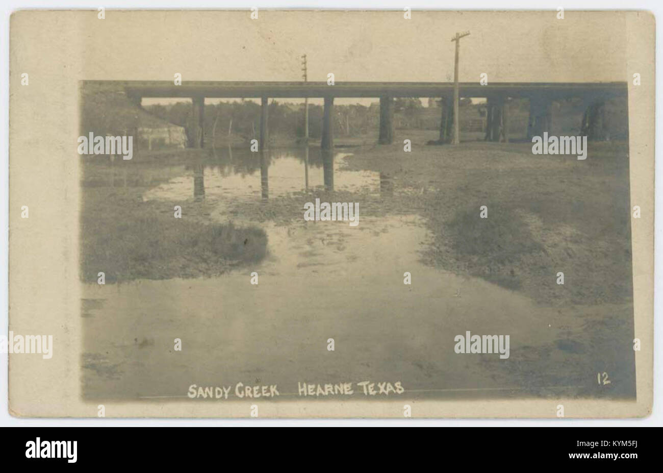 A historic postcard image of Sandy Creek in Hearne, Texas, showcasing ...