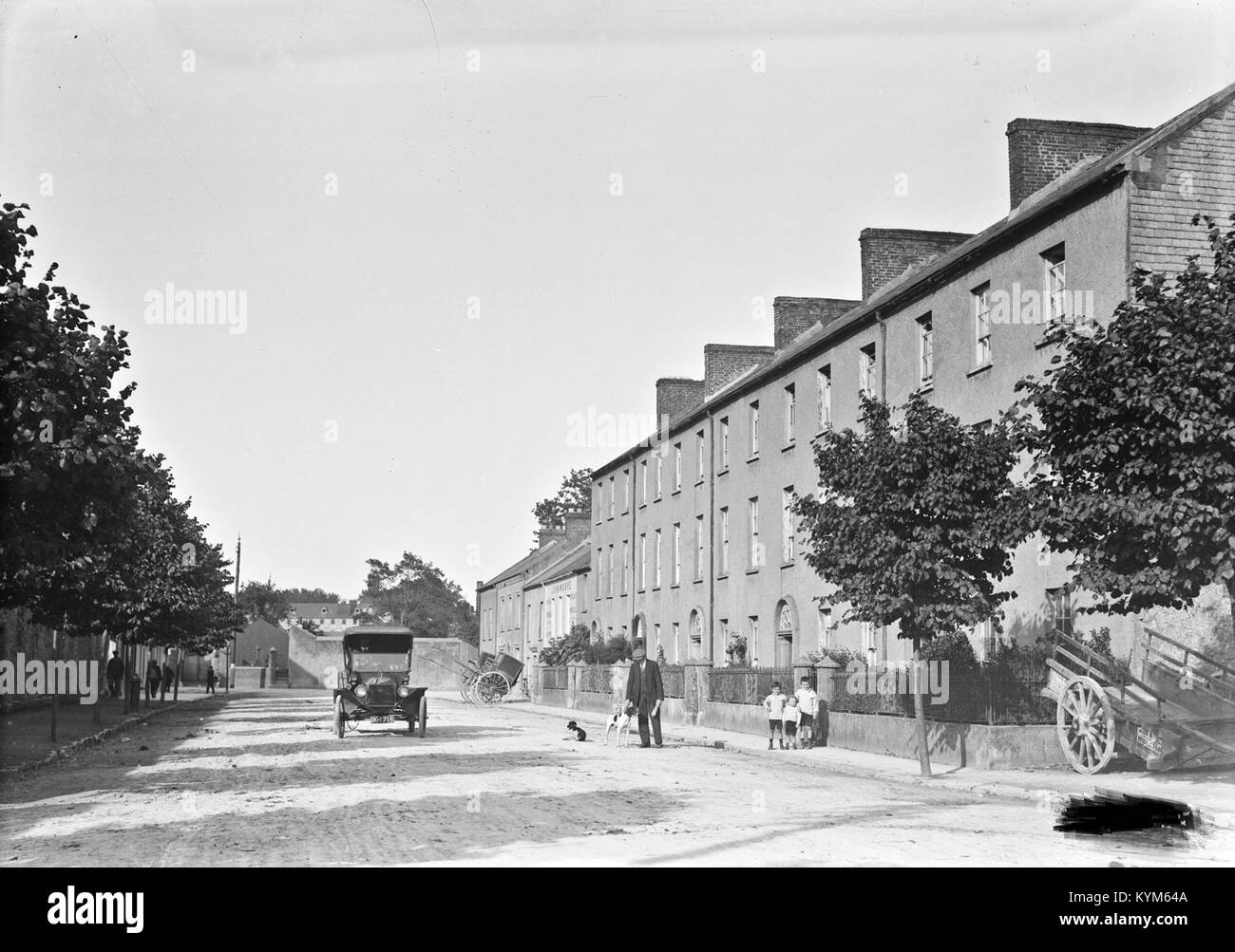 A street view of Midleton, County Cork, featuring a Ford motor car ...