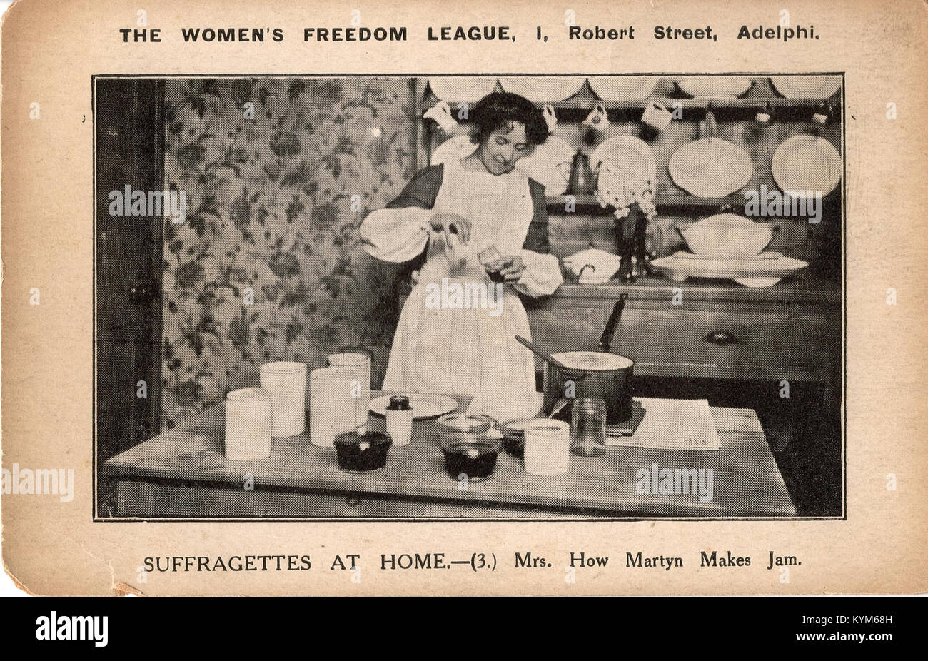 A photograph of Mrs. How-Martyn making jam, capturing a domestic scene ...