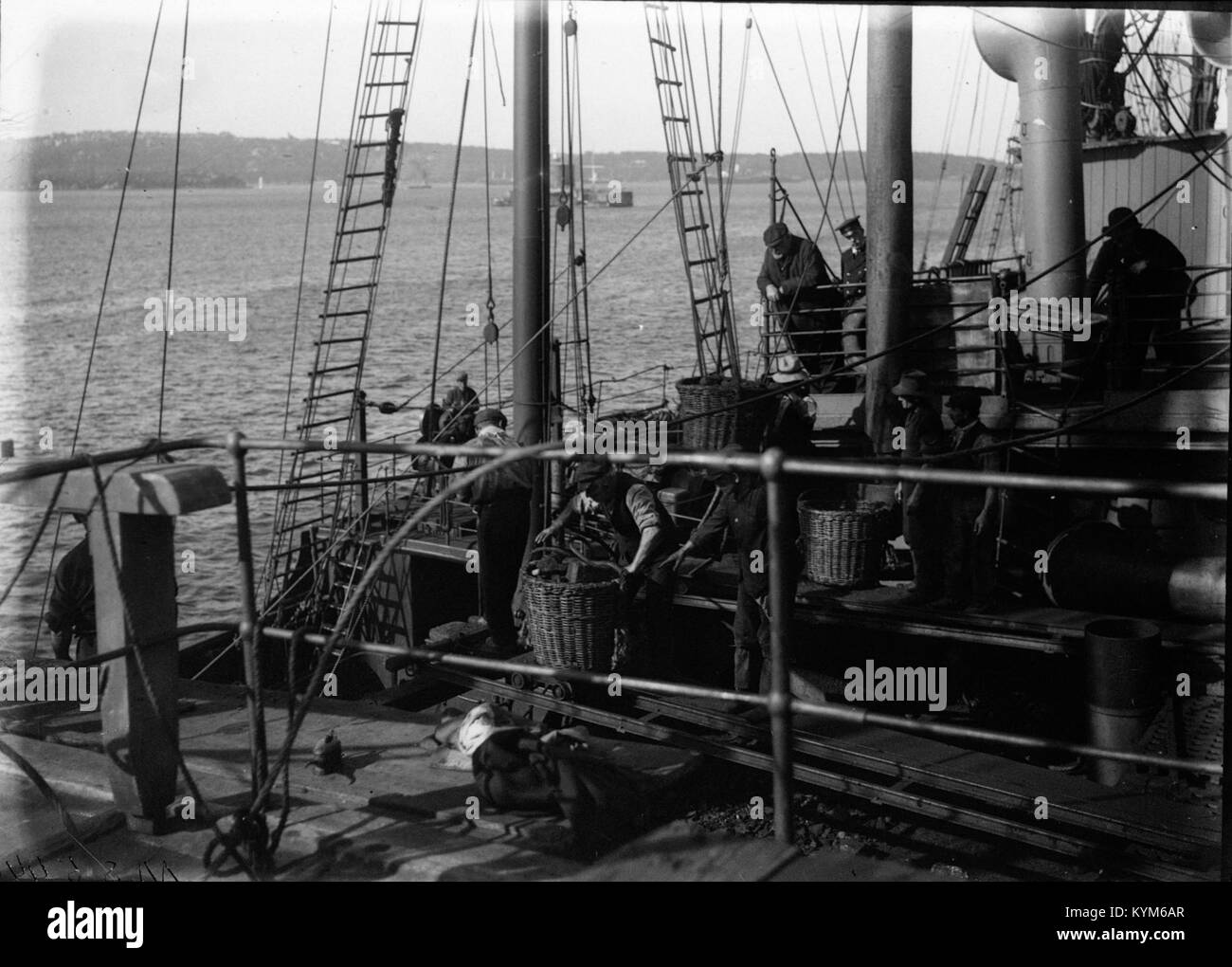 Image from a historic coal strike in Sydney, showing laborers loading ...