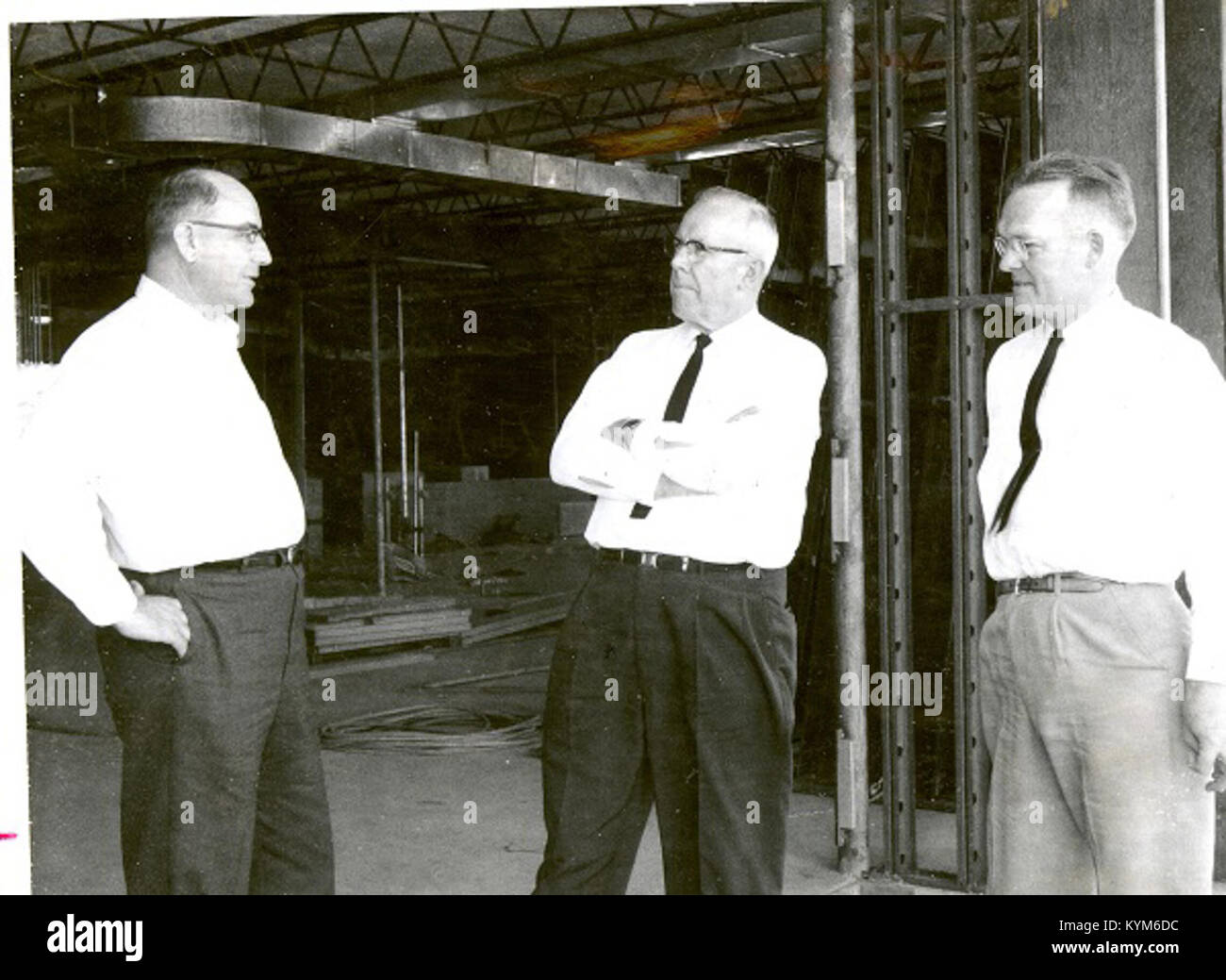 A photograph of individuals named Kauffman, Yost, and Martin in ...