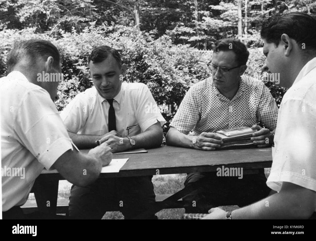 Photograph of Ben Cutrell, David Shank, and Paul Lederach during a 1953 ...