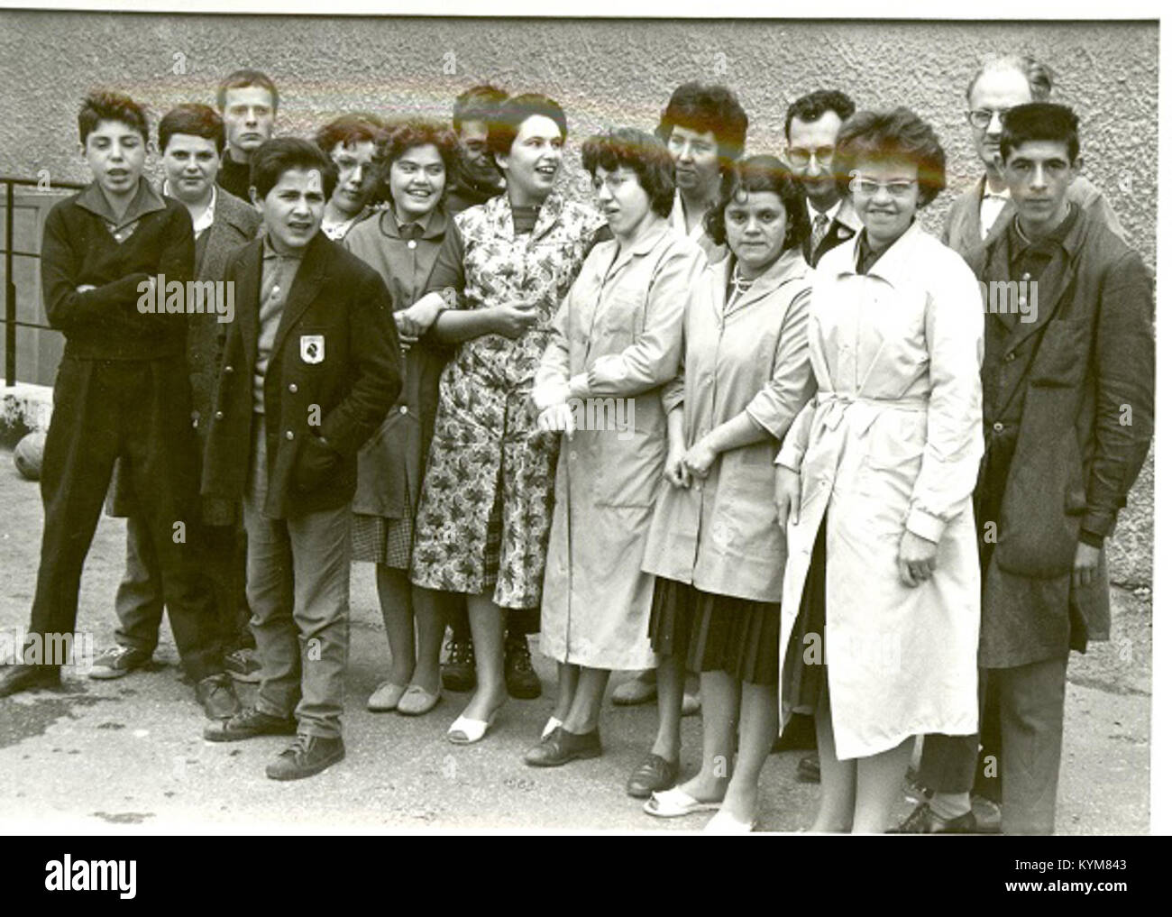 A group of people in France, captured in 1962. The photo shows ...