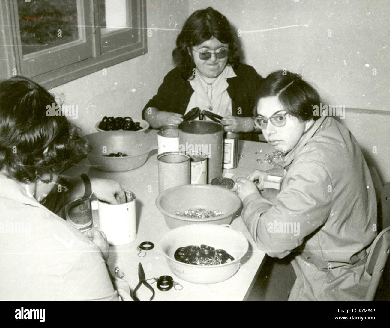 A photograph from 1965 showing a sheltered workshop in Paris, France ...