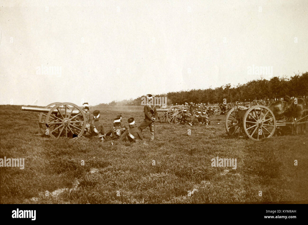 A historical illustration of artillerymen operating a cannon. The image ...