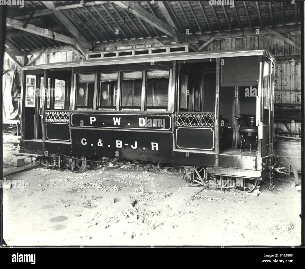 This historical image showcases a railway car used on the Goondah ...