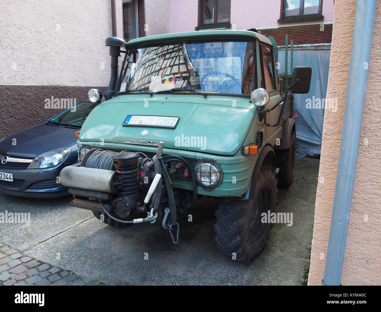 A historical image featuring an Unimog vehicle in Neuenbürg, captured ...
