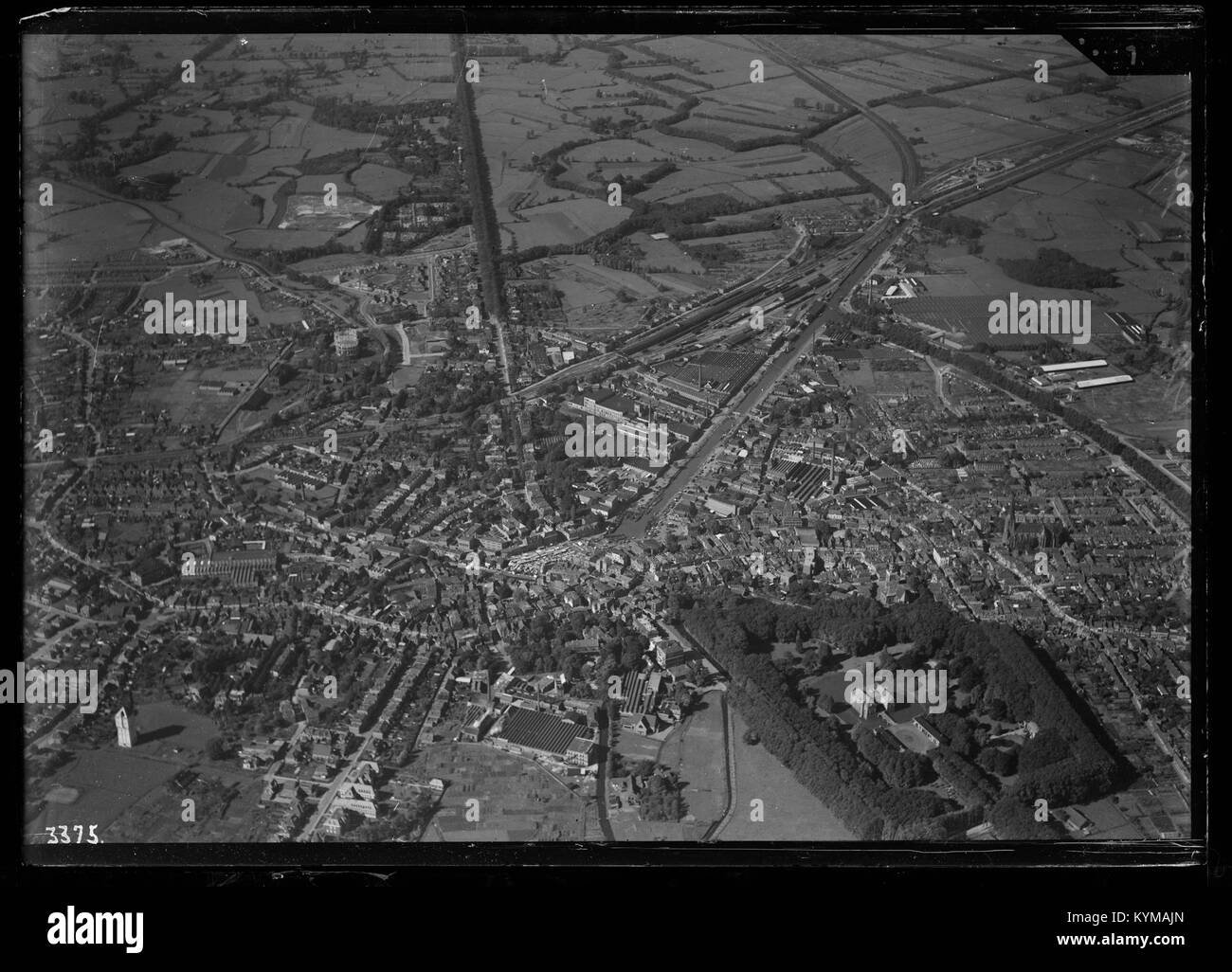 An aerial photograph taken between 1920 and 1940, capturing a landscape ...