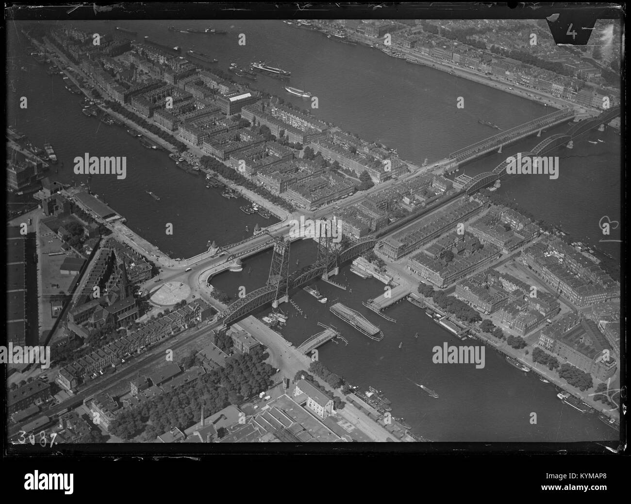 This image captures the city of Rotterdam, showcasing its modern ...