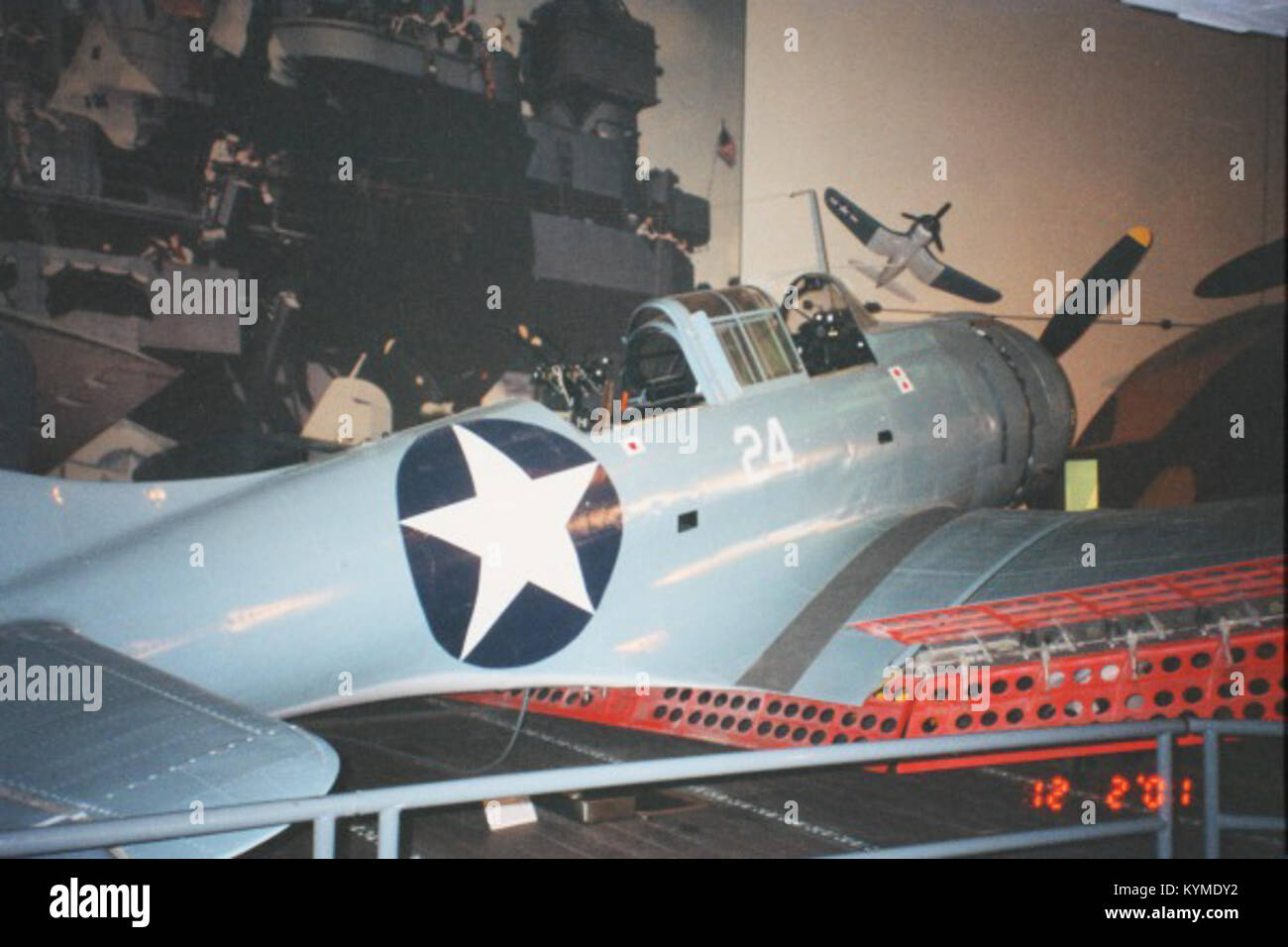 The image shows a historical depiction of the Douglas SBD Dauntless, a ...