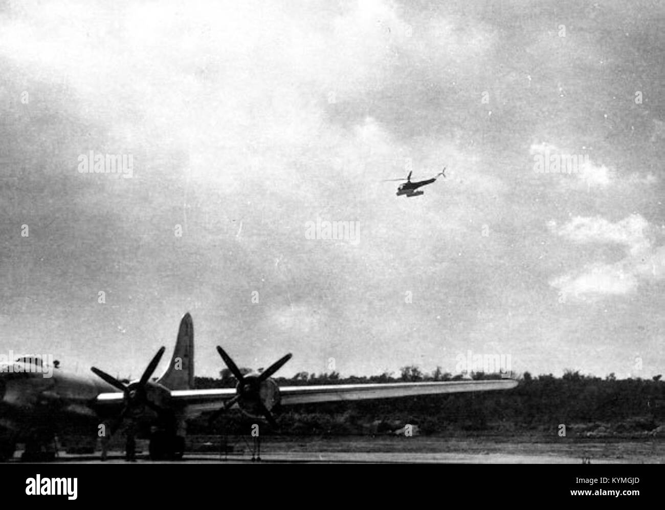 A historical photograph from the 9th Bomb Group, showing an aircraft in ...