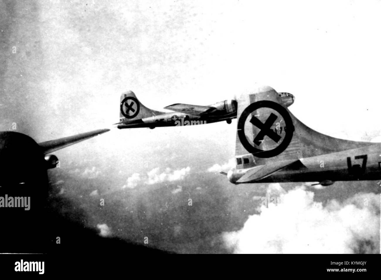 A photograph from the 9th Bomb Group, documenting a key moment in the ...