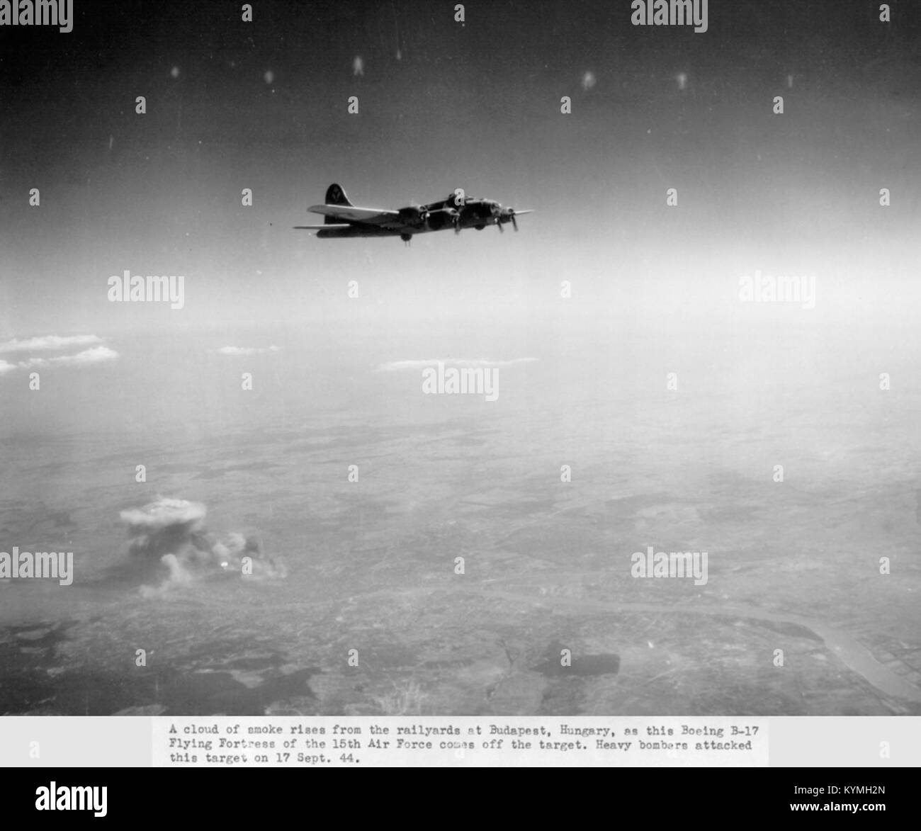 This photograph shows a Boeing B-17 Flying Fortress, a historic World ...