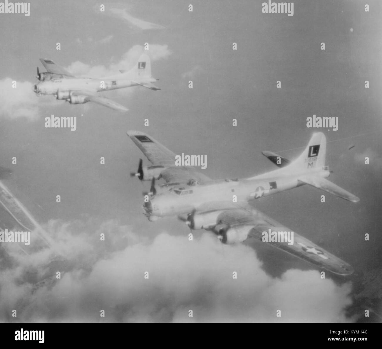 A photograph of a Boeing B-17 Flying Fortress in flight, capturing its ...