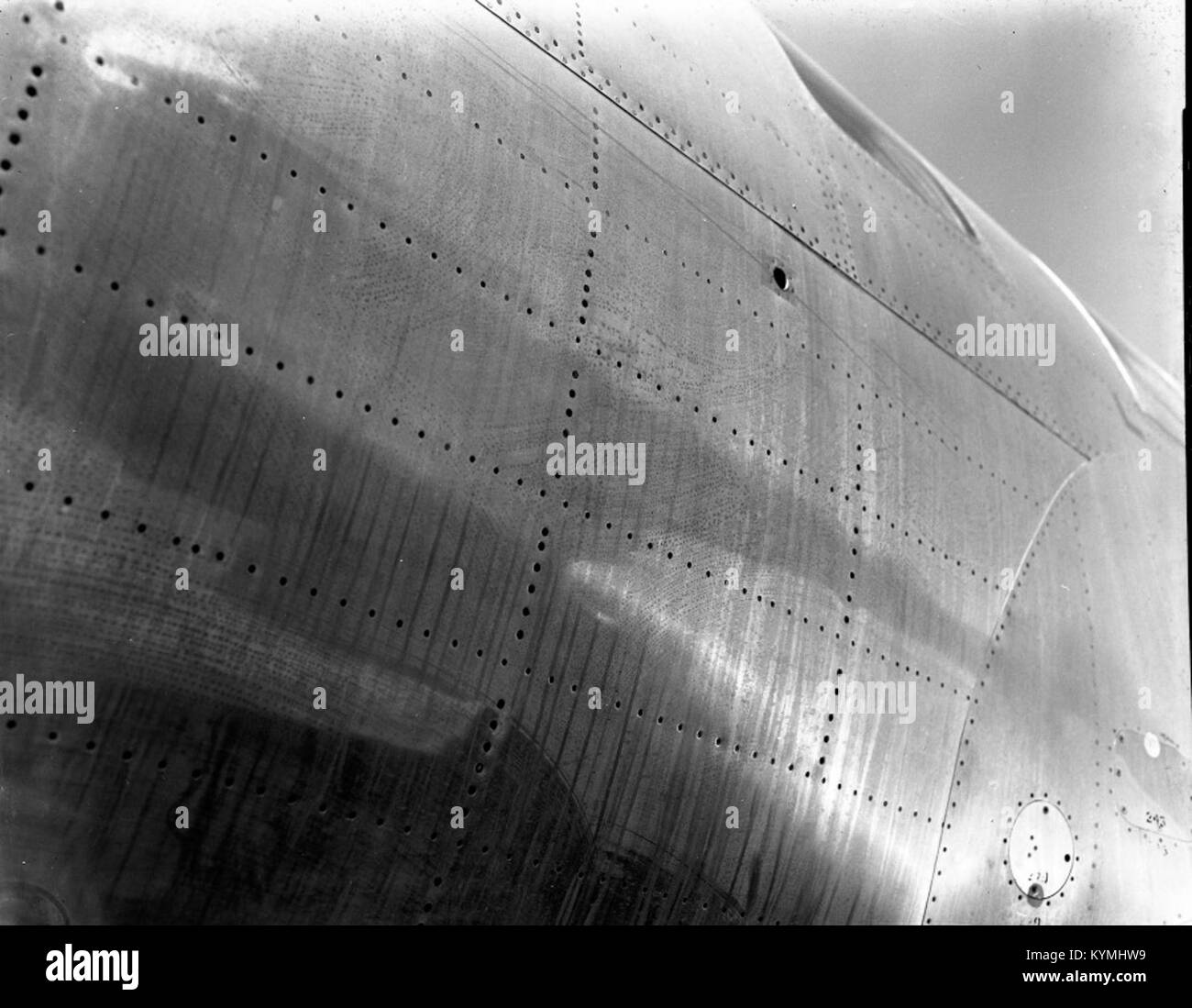 A photograph of a Convair aircraft, captured in a negative format ...