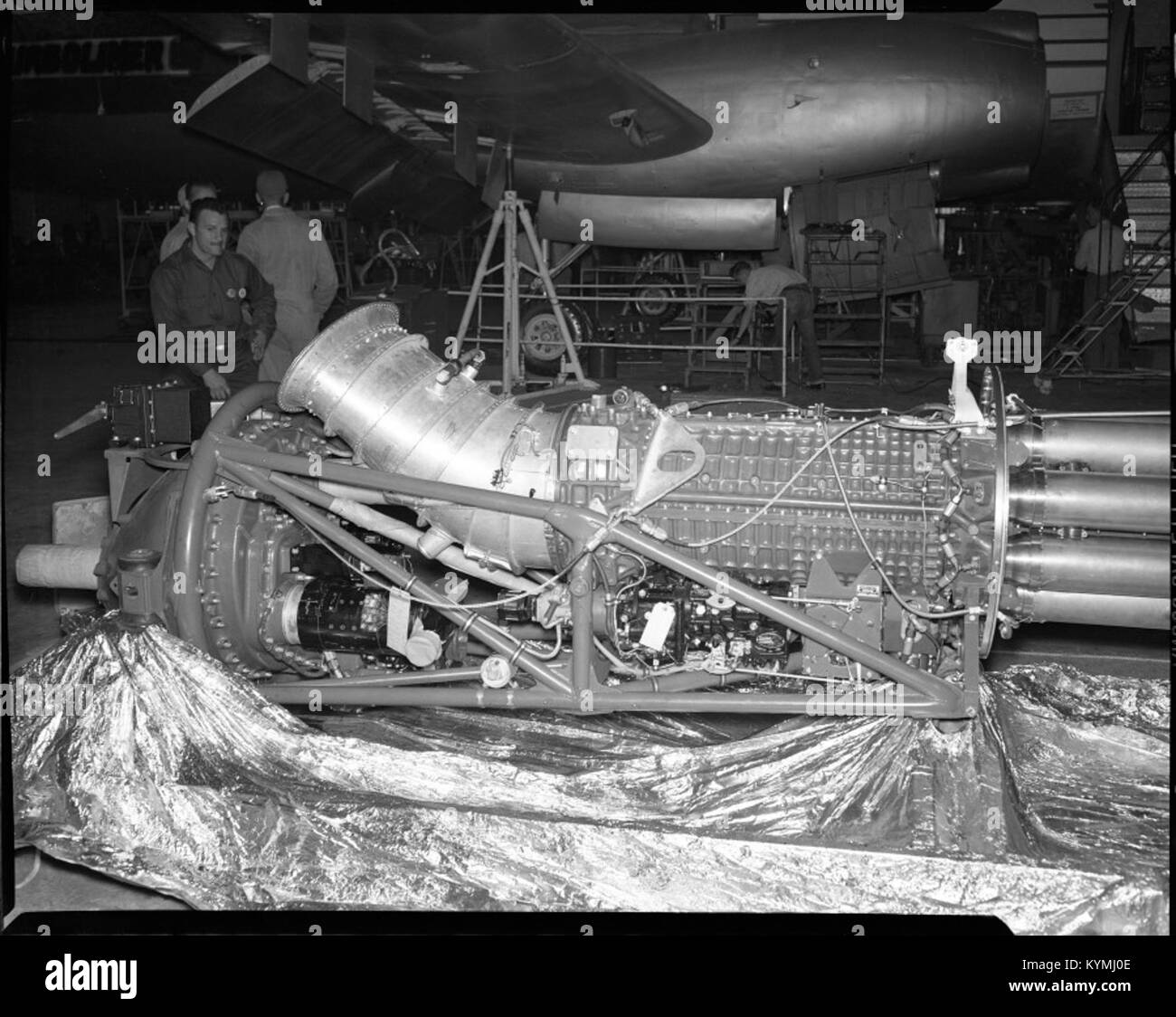 A historical photograph of a Convair aircraft, captured in flight or on ...